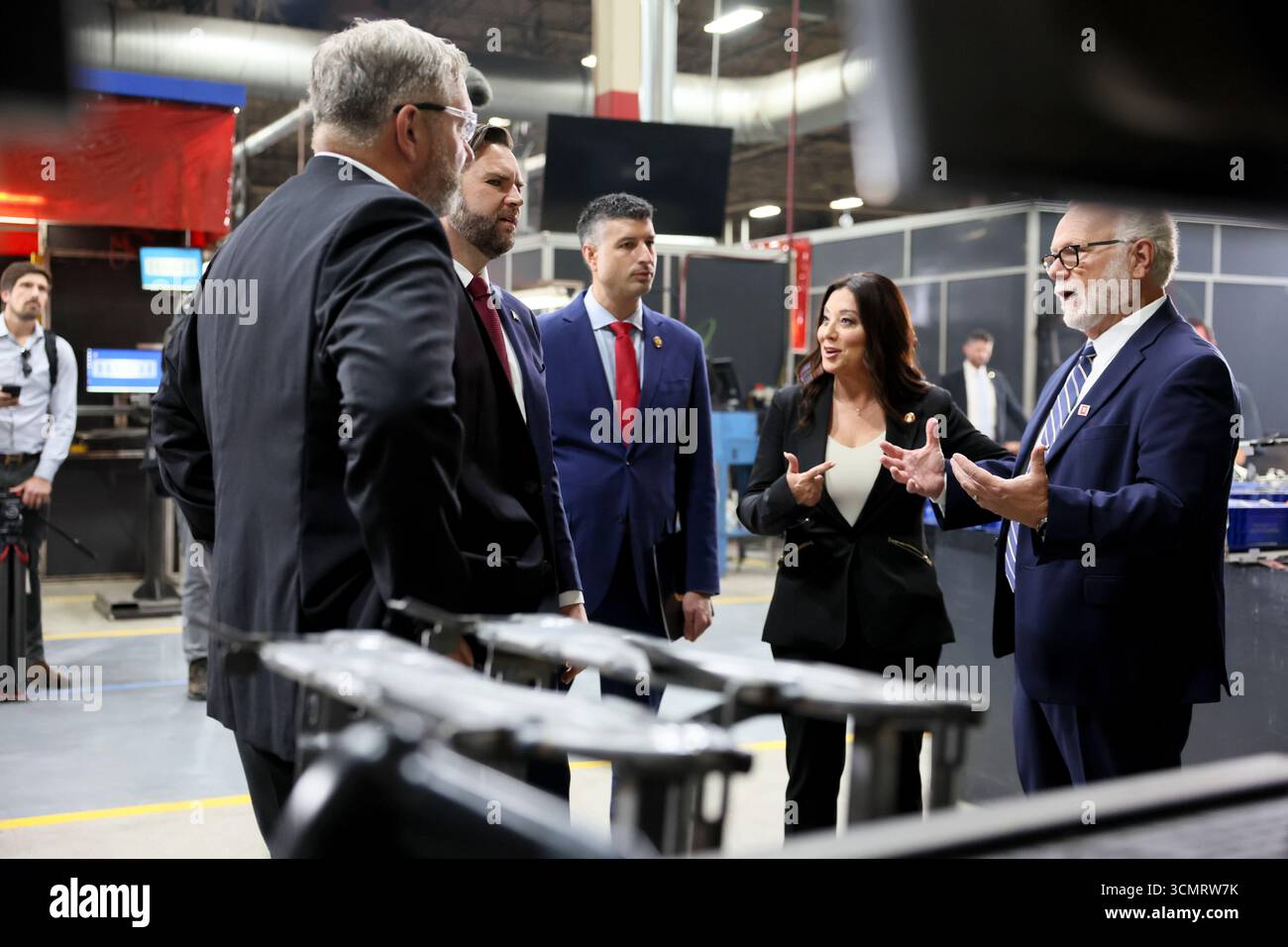 Vice President JD Vance, second from left, visits Hatch Stamping ...