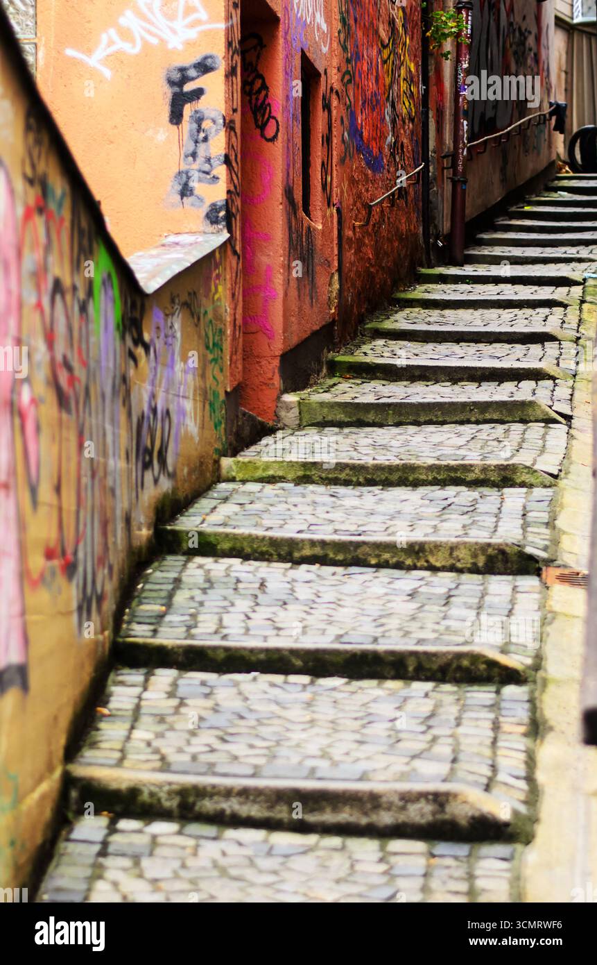 AUGSBURG, GERMANY — JUNE 27 2025: cobblestone steps leading up along a ...