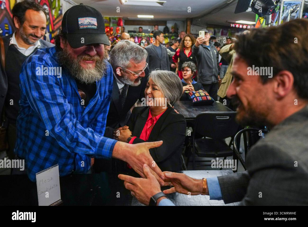Presidential candidate Jeannette Jara is greeted by supporters as the ...