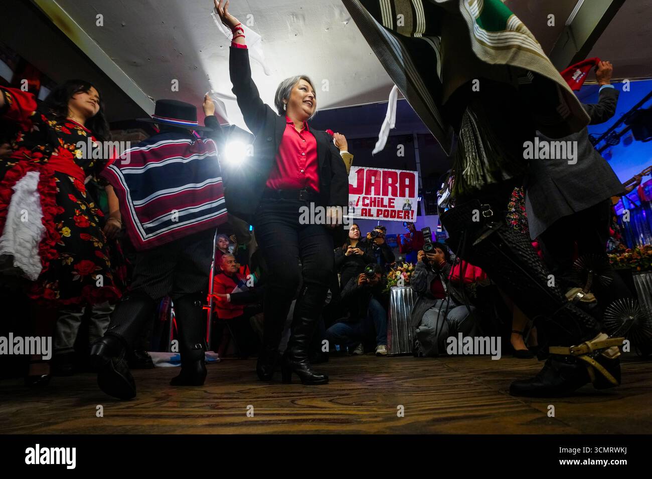 Presidential candidate Jeannette Jara dances the traditional Cueca as ...
