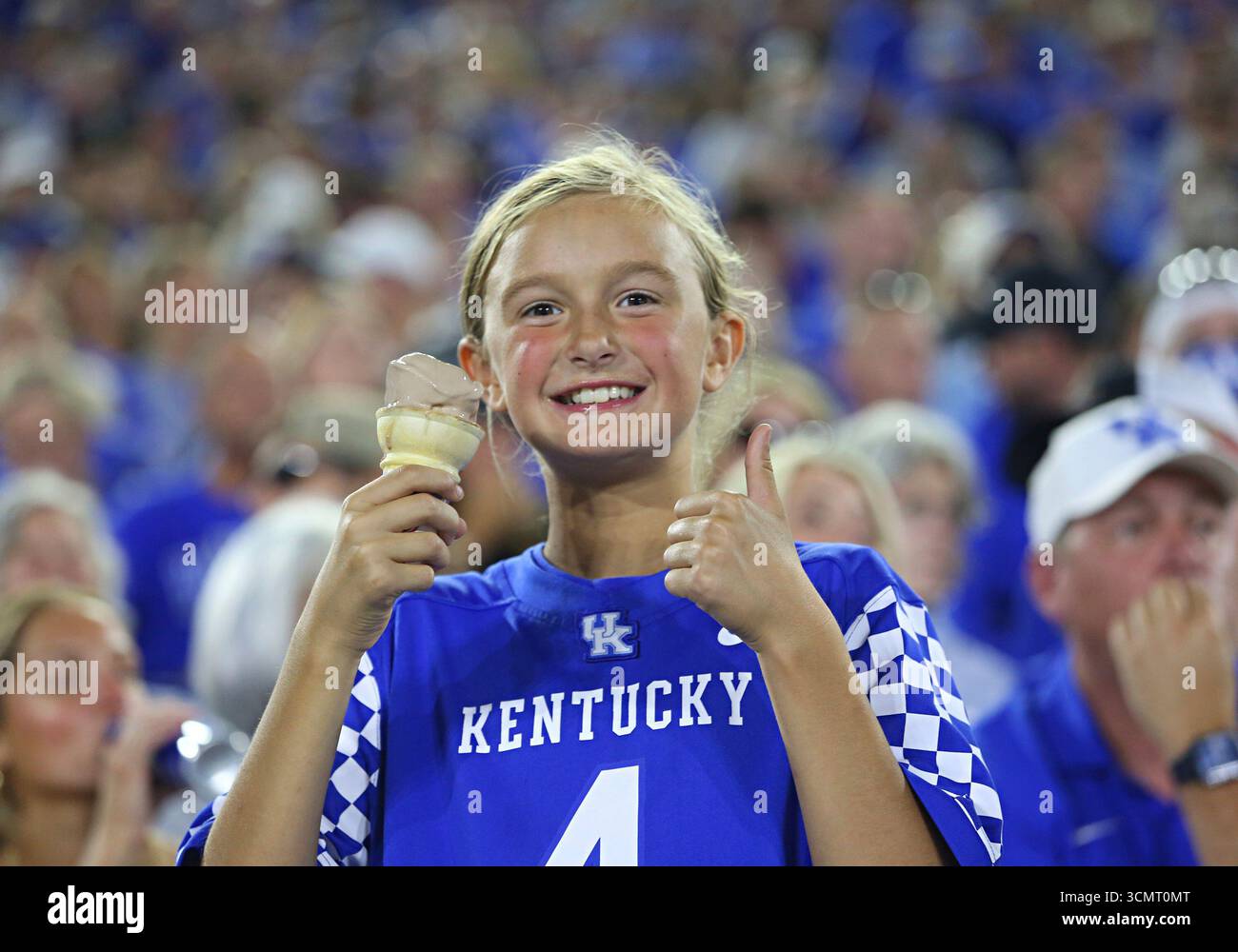 LEXINGTON, KY - SEPTEMBER 13: A Kentucky Wildcats fan enjoys an ice ...