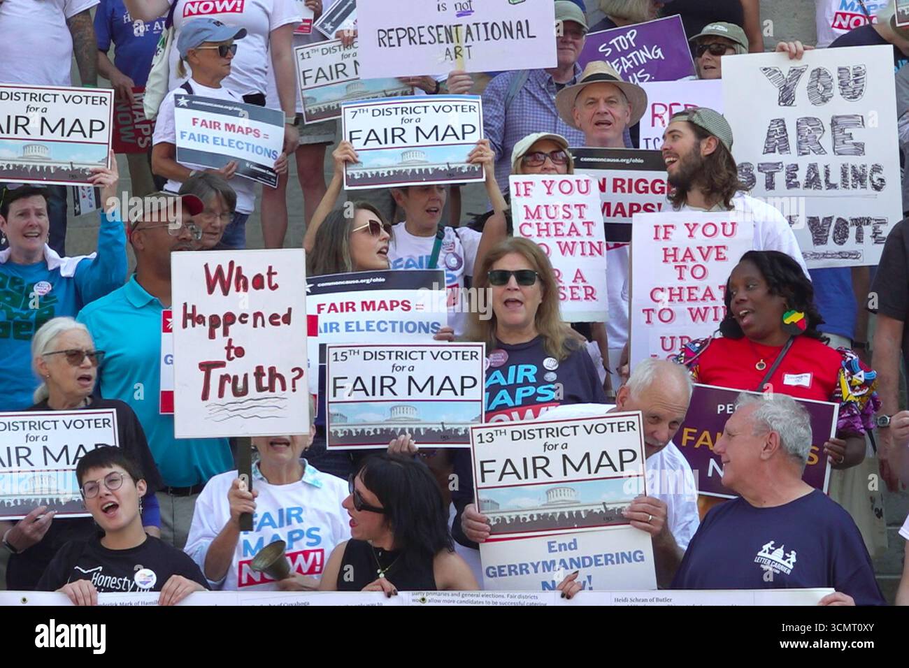 This photo taken from video shows organizers rallying outside of the ...