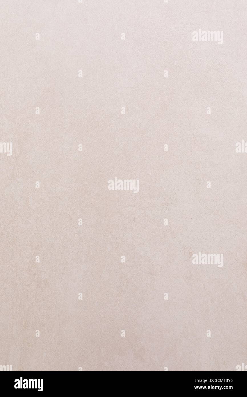 Smooth light beige plaster wall texture with subtle variations in tone ...