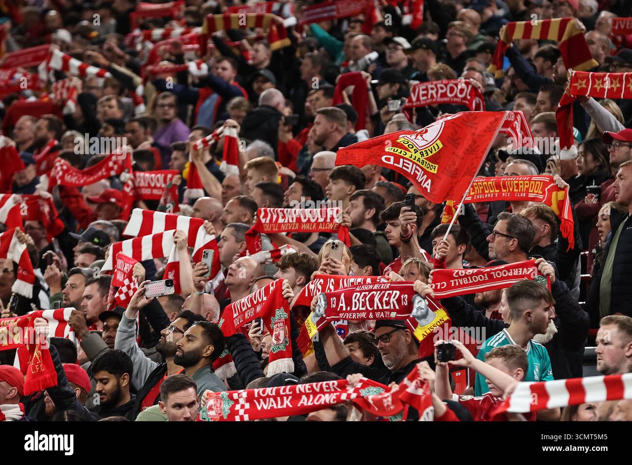 Liverpool fans sing “You’ll never walk alone” during the UEFA Champions ...