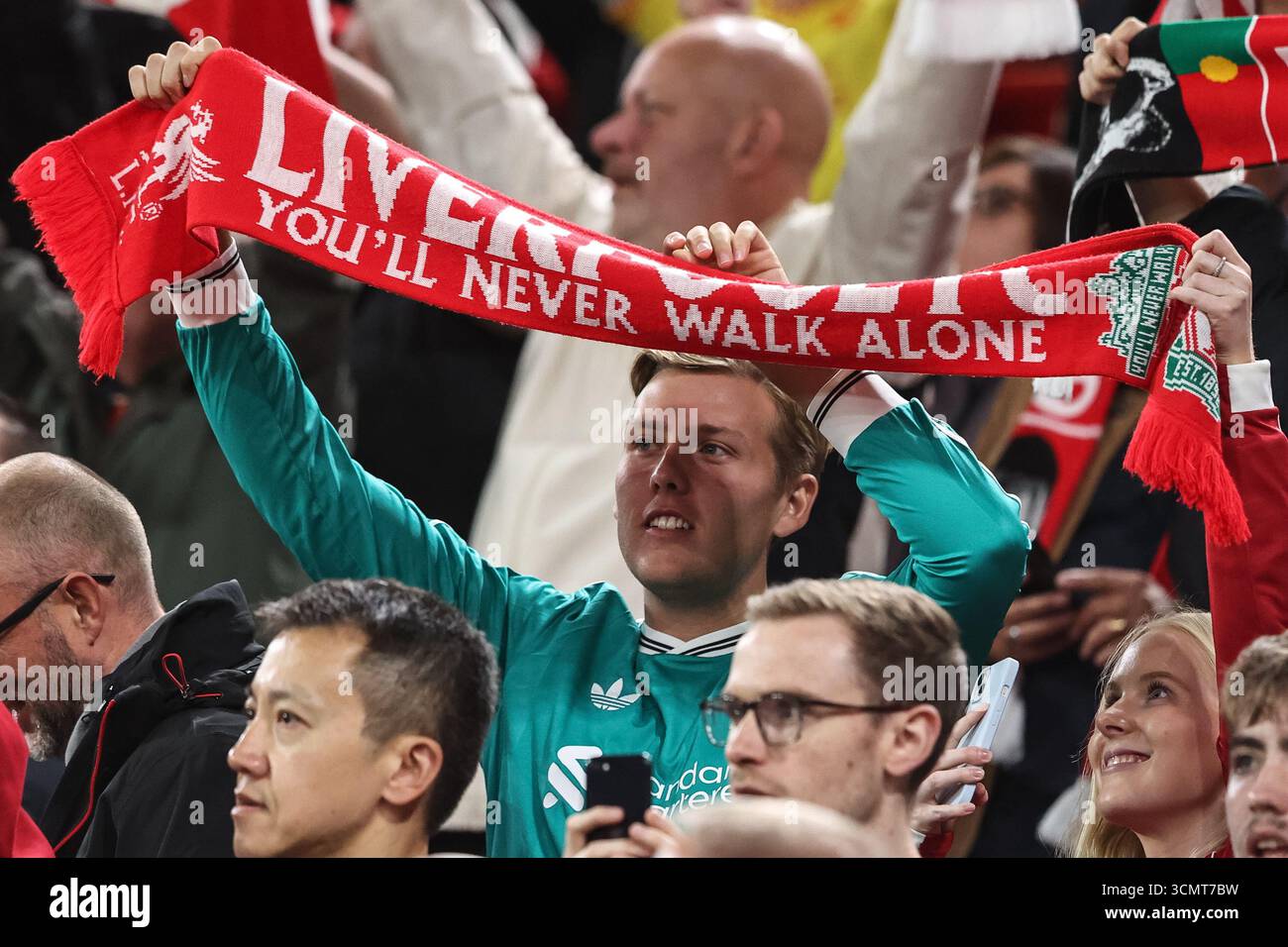 Liverpool fans sing “You’ll never walk alone” during the UEFA Champions ...