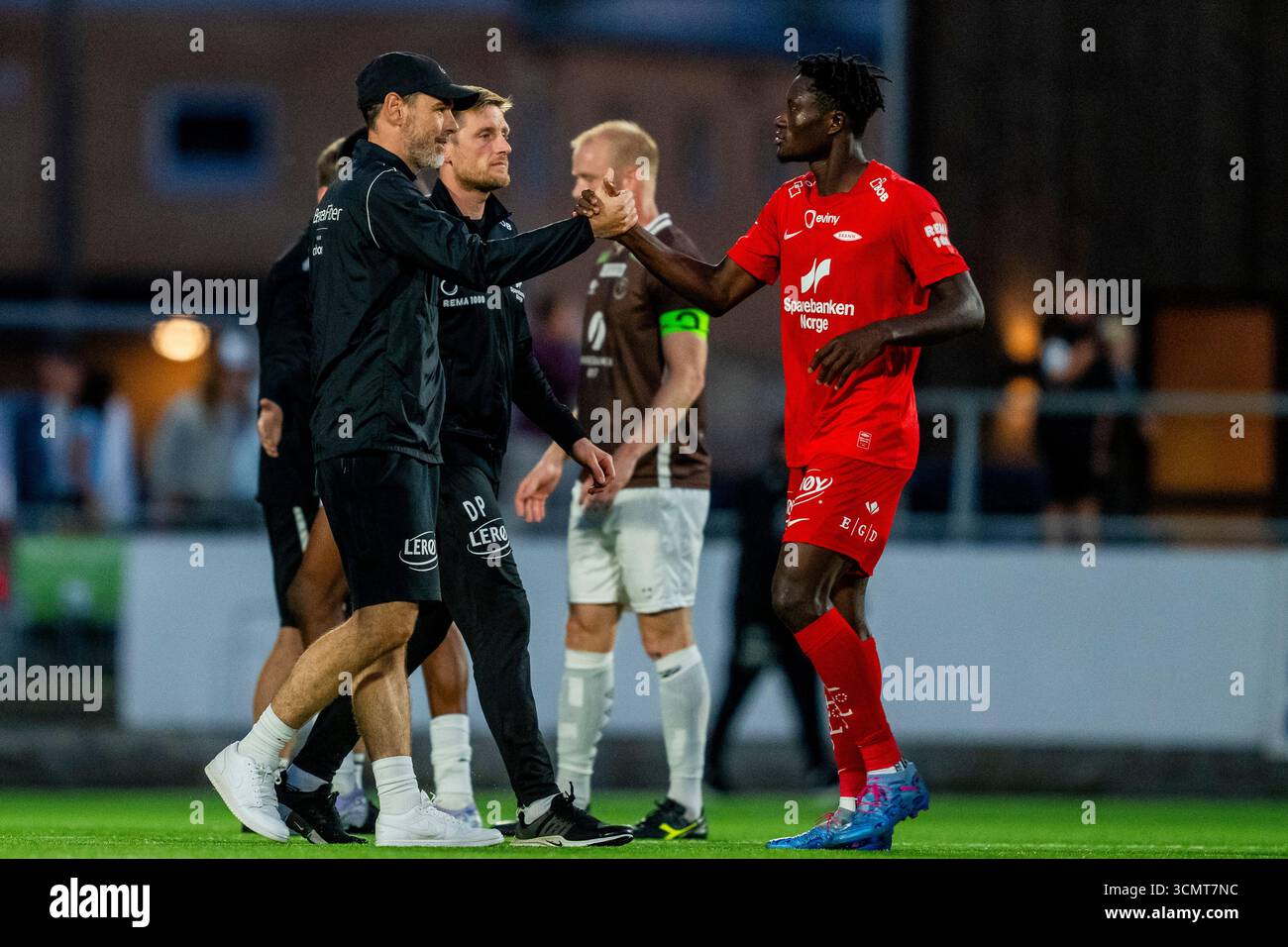 Mjøndalen 20250917. Brann's coach Freyr Alexandersson and Nana Boakye ...