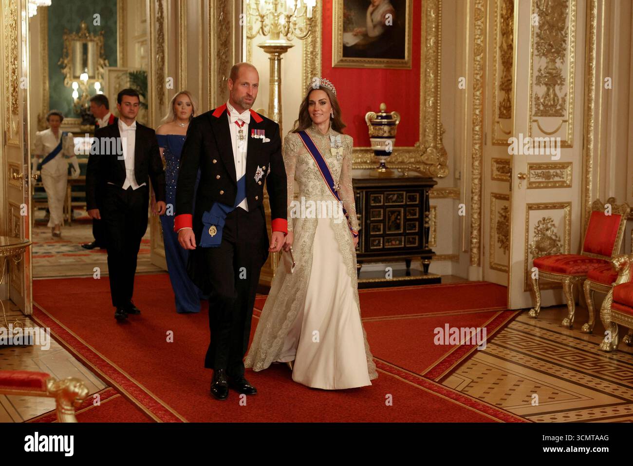 Britain's Kate and Prince William arrive for a State Banquet at Windsor ...