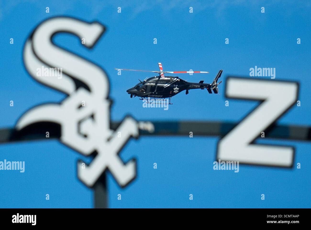 A Cook County Sheriff's helicopter flies over Rate Field during the ...