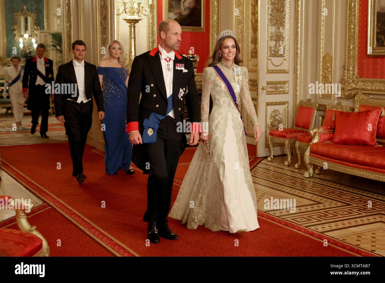 Britain's Kate and Prince William arrive for a State Banquet at Windsor Castle, in Windsor ...