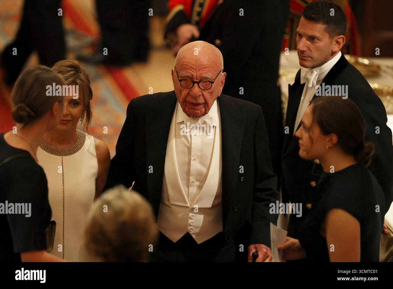 Rupert Murdoch, center, arrives for a State Banquet at Windsor Castle ...