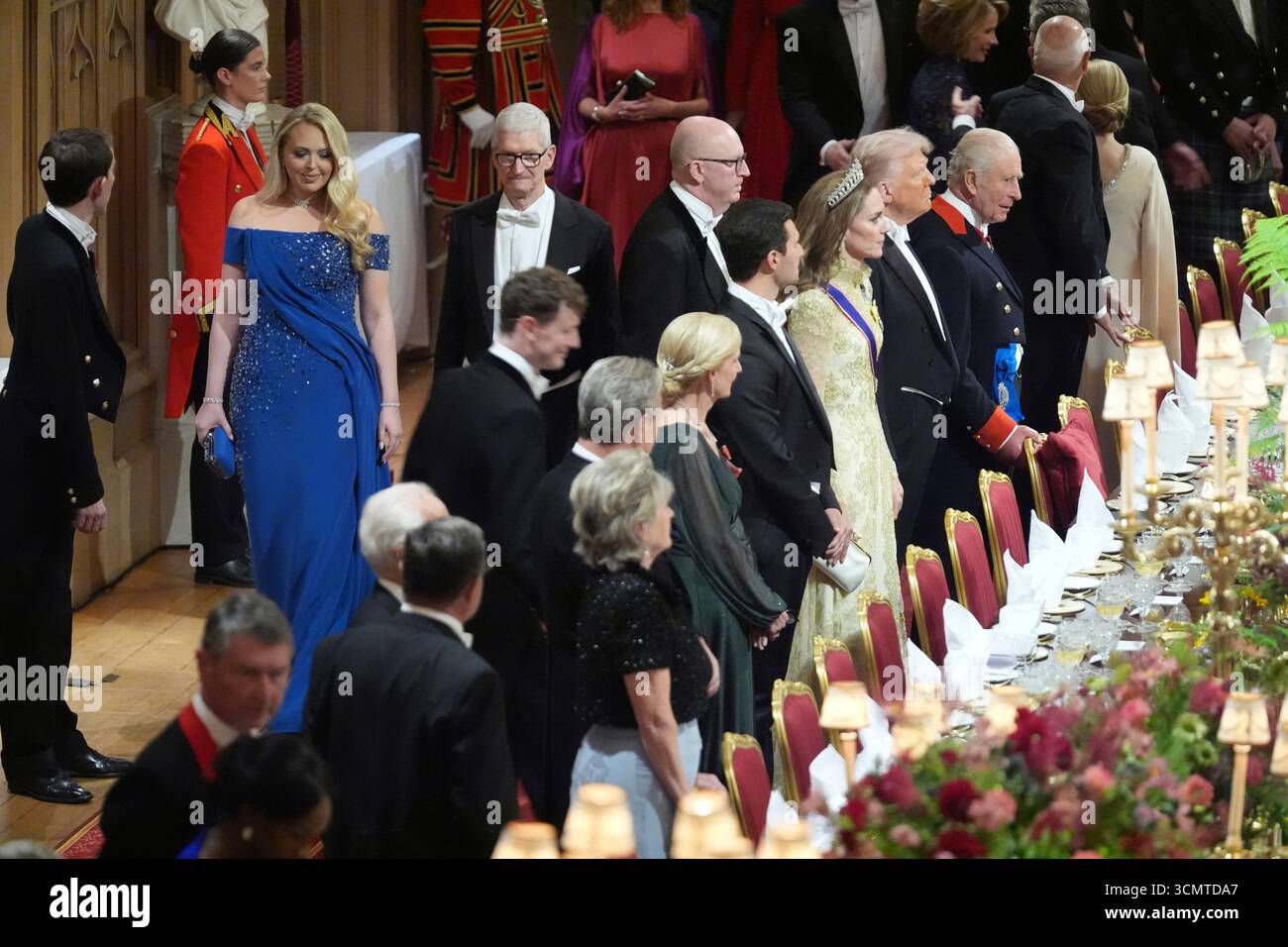 Tiffany Trump, third left, and Tim Cook, fourth left, arrive for a ...