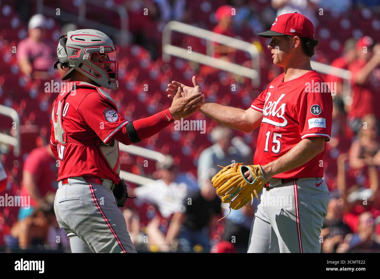 Cincinnati Reds' Emilio Pagan (15) and Jose Trevino celebrate a victory ...