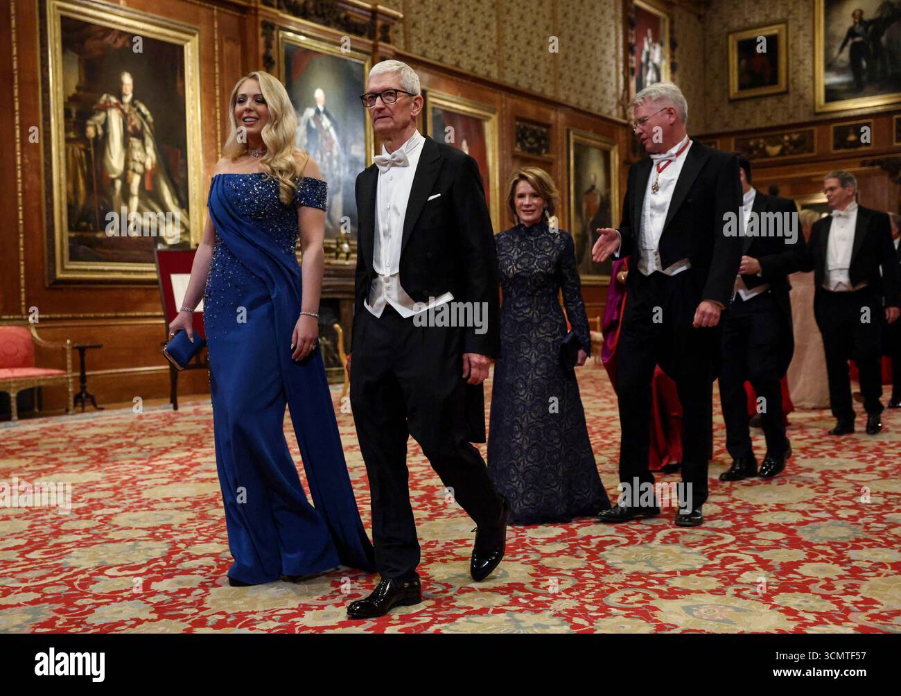 Apple CEO Tim Cook, front, arrives for a State Banquet at Windsor ...