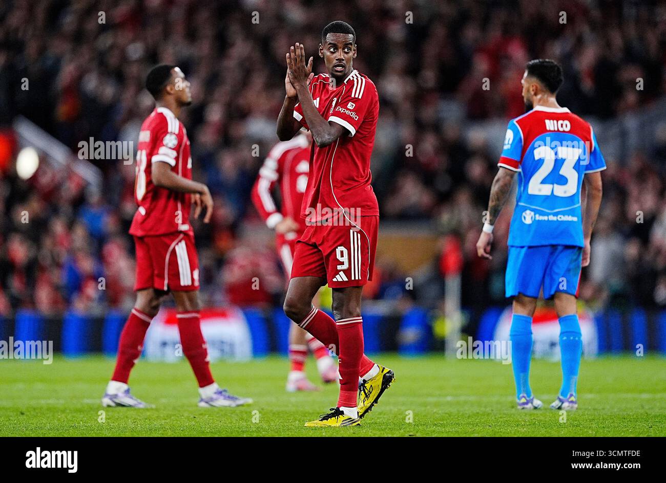 Liverpool's Alexander Isak (centre) applauds the fans as he is ...