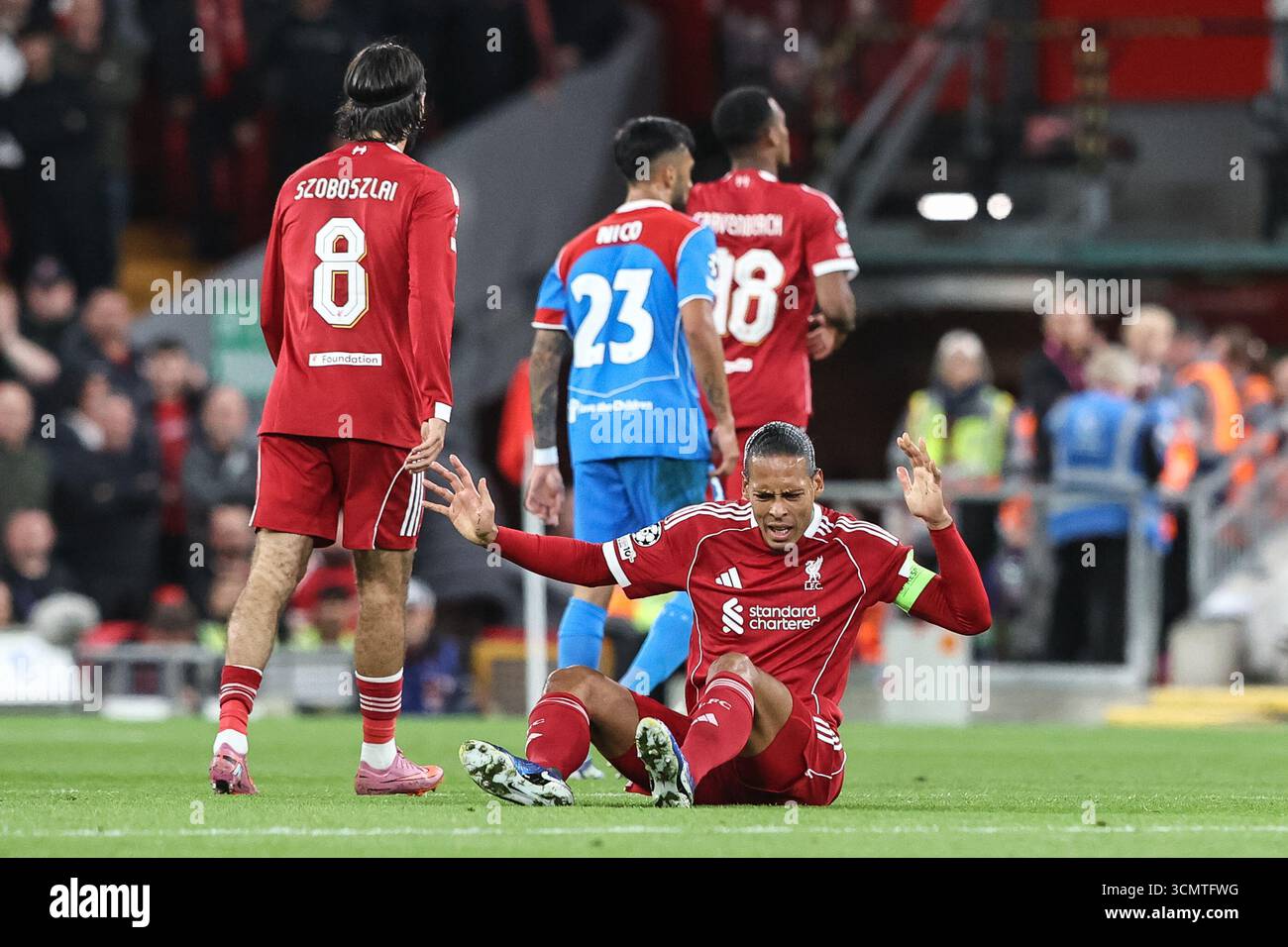 Virgil van Dijk of Liverpool takes a knock during the UEFA Champions ...