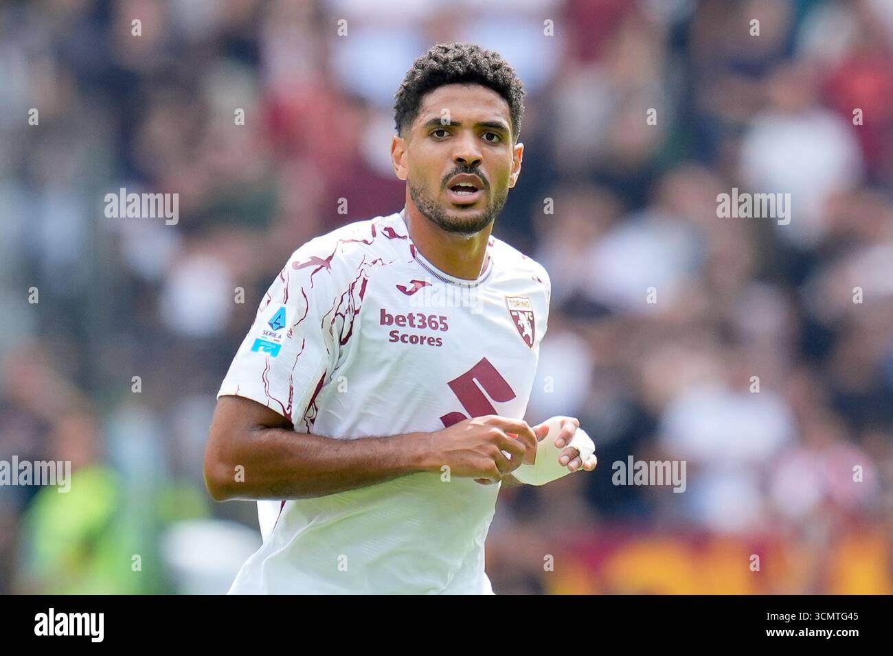 Saul Coco of Torino FC looks on during the Serie A match between AS ...