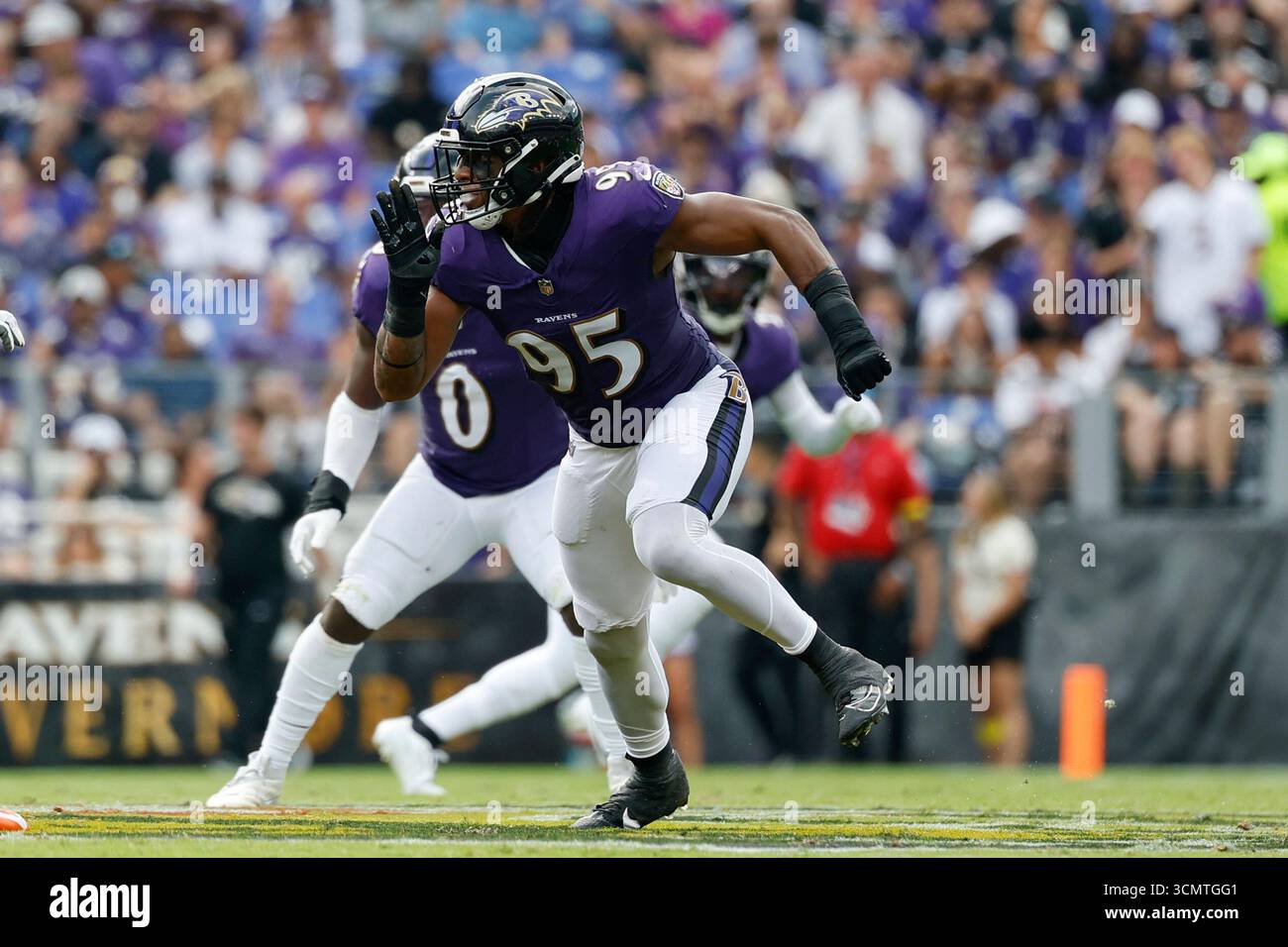 Baltimore Ravens linebacker Tavius Robinson (95) in action during the ...