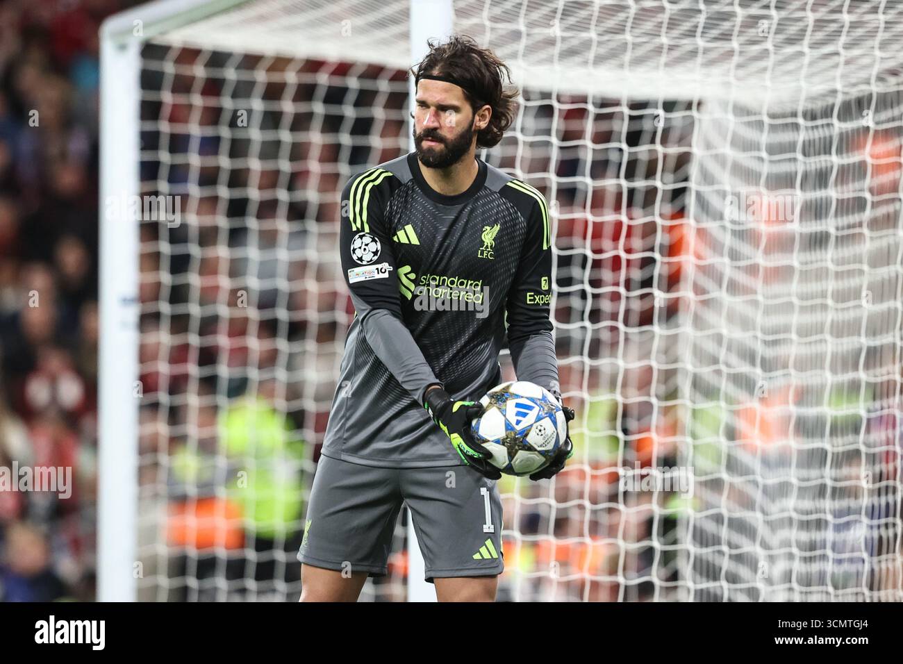 Alisson Becker of Liverpool with the ball during the UEFA Champions ...