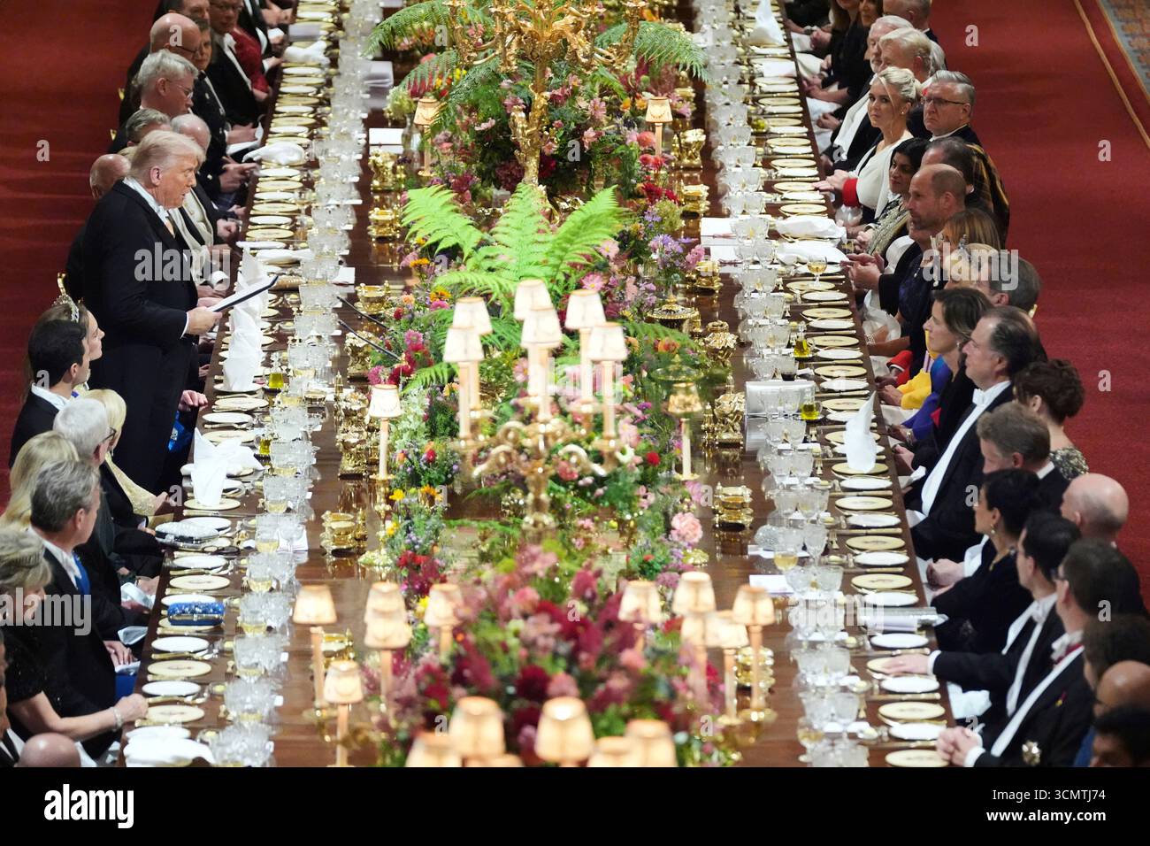 President Donald Trump, center left, speaks during a State Banquet at ...