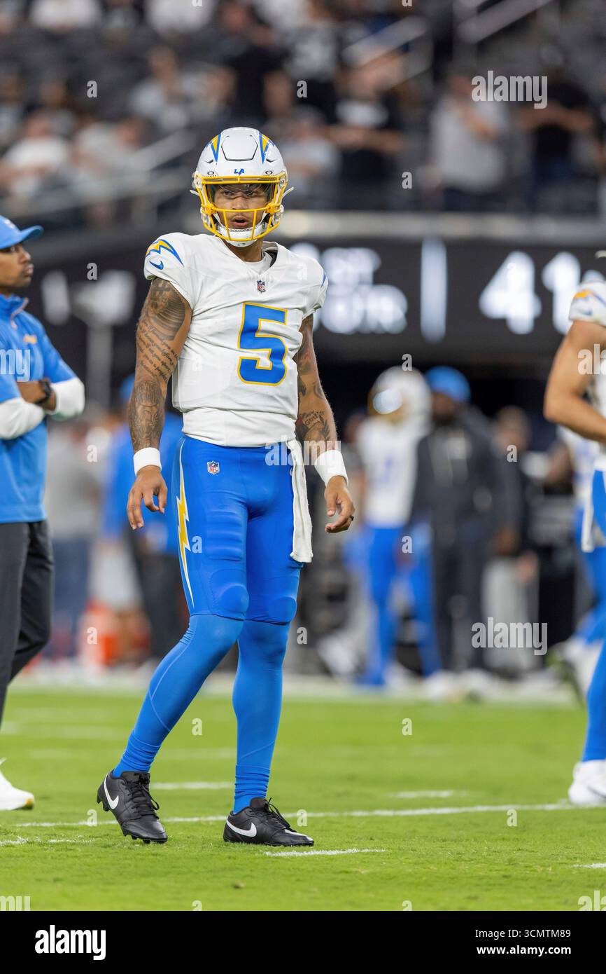 Los Angeles Chargers quarterback Trey Lance (5) warms up before playing ...