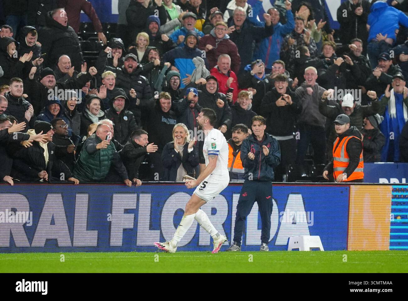 Swansea City's Cameron Burgess celebrates scoring their side's third ...