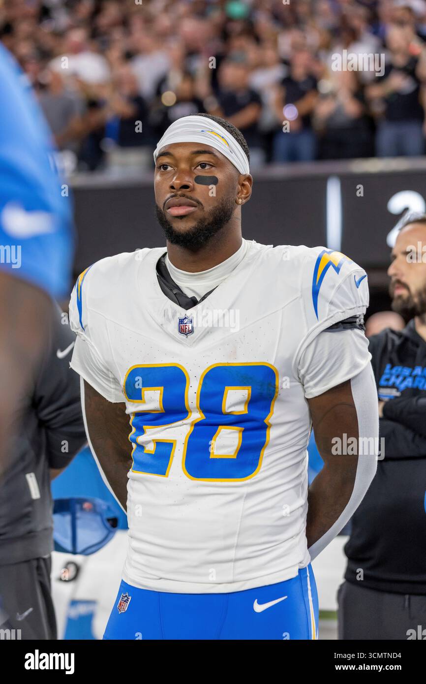 Los Angeles Chargers running back Hassan Haskins (28) stands for the ...