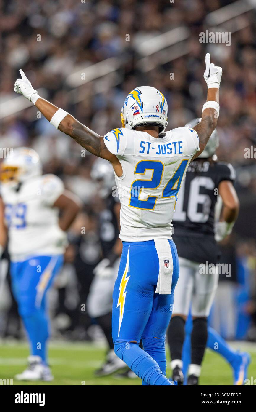 Los Angeles Chargers cornerback Benjamin St-Juste (24) holds his arms ...