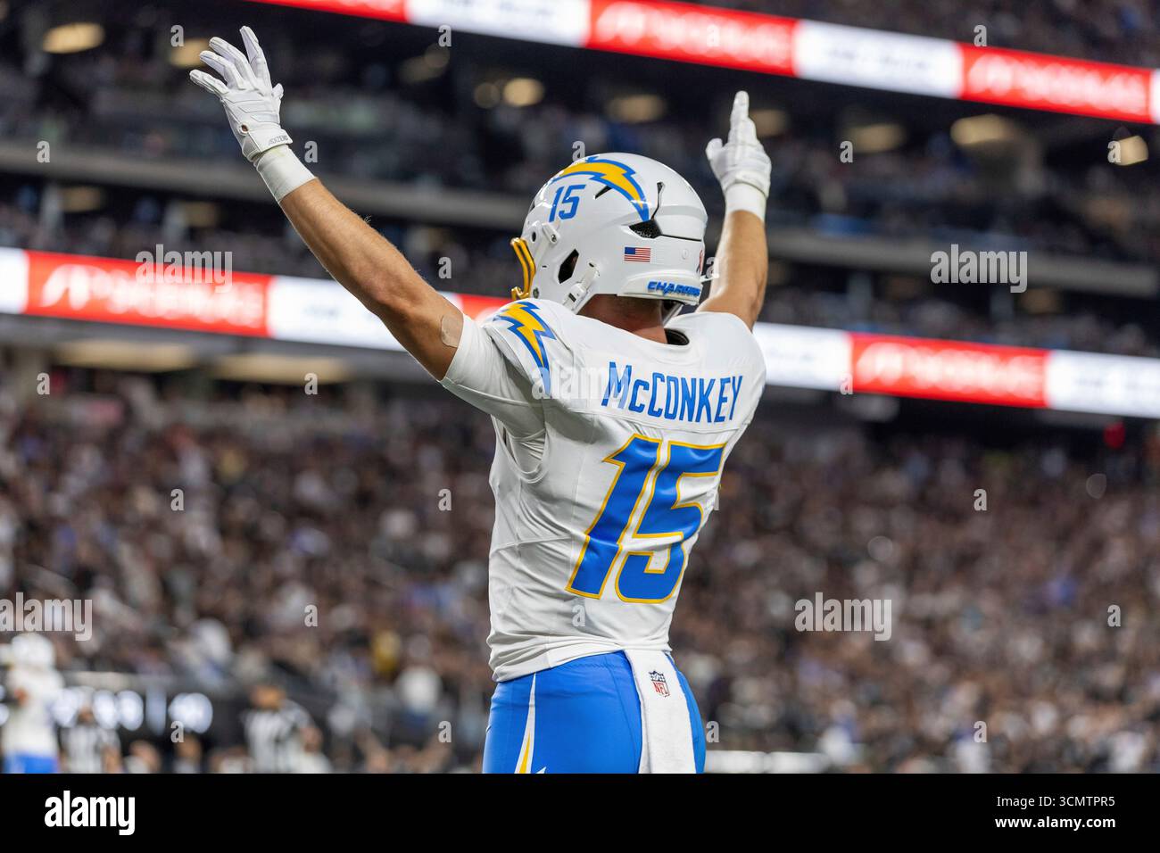 Los Angeles Chargers wide receiver Ladd McConkey (15) puts his arms up ...