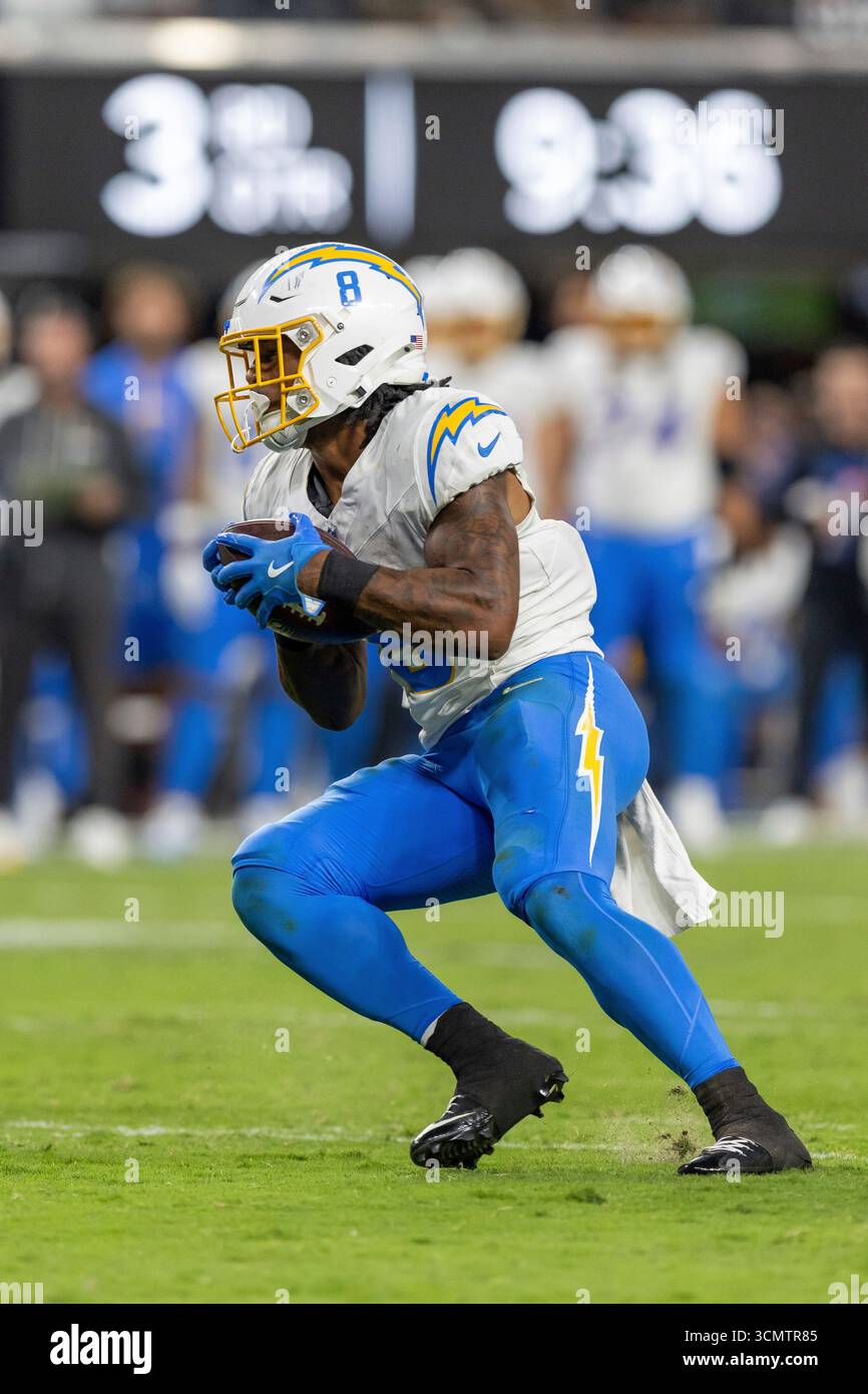Los Angeles Chargers running back Omarion Hampton (8) runs the ball ...