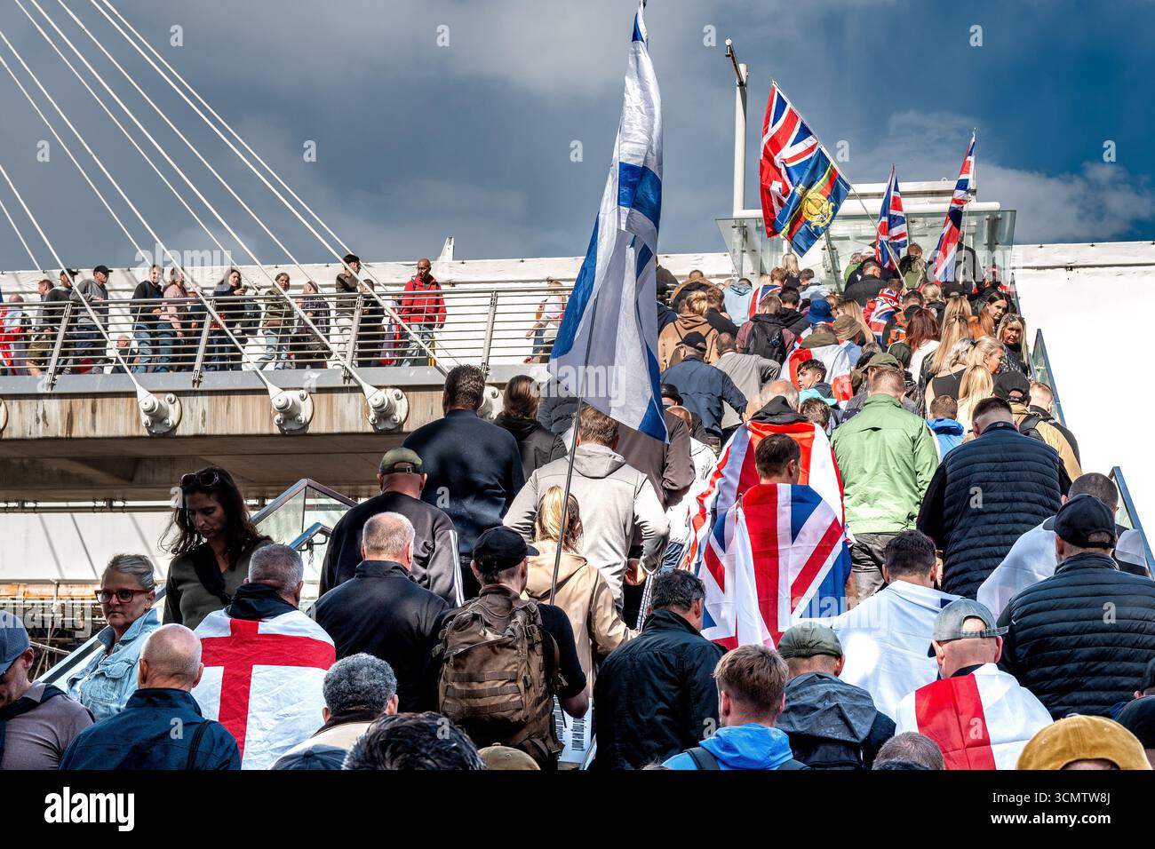 Demonstrators carrying union Flags on the unite England Tony Robinson ...