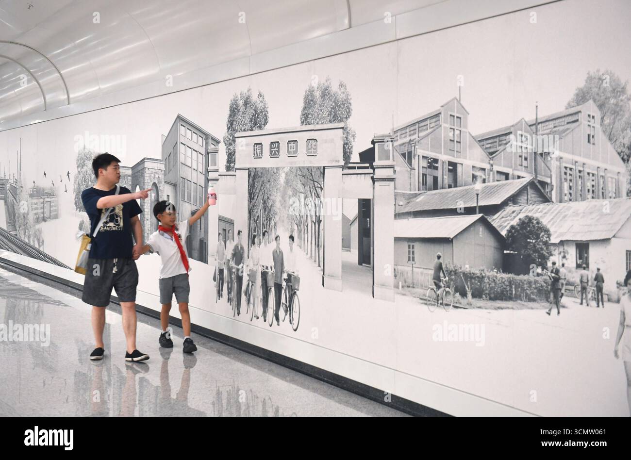 CHENGDU, CHINA - SEPTEMBER 17, 2025 - Citizens pass by the Jichechang ...