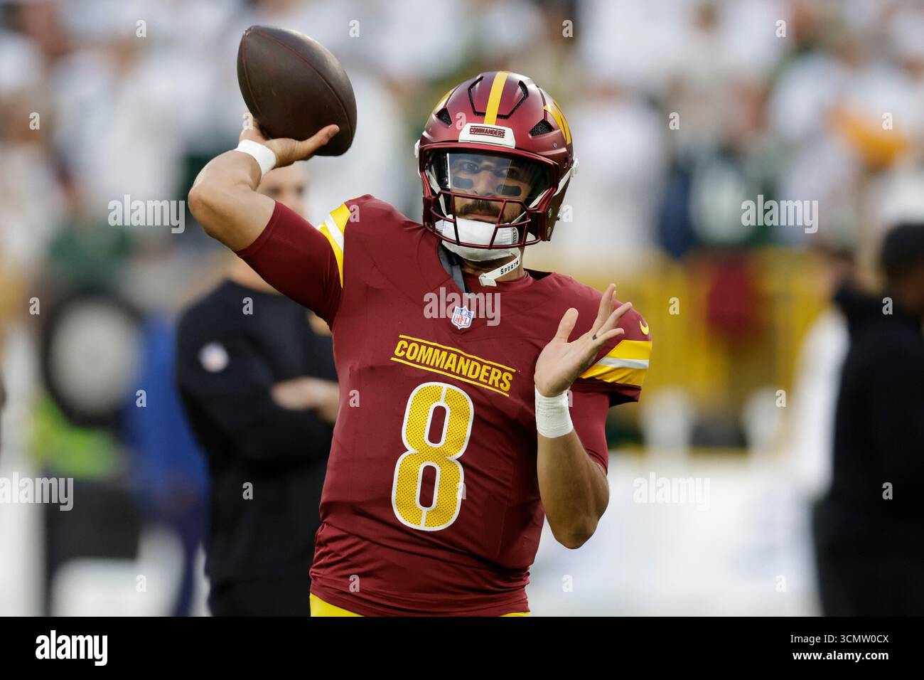 FILE - Washington Commanders quarterback Marcus Mariota warms up before ...