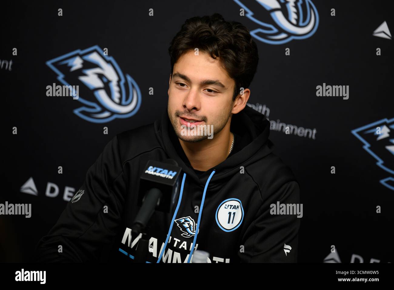 Utah Mammoth right wing Dylan Guenther speaks during media day ahead of ...