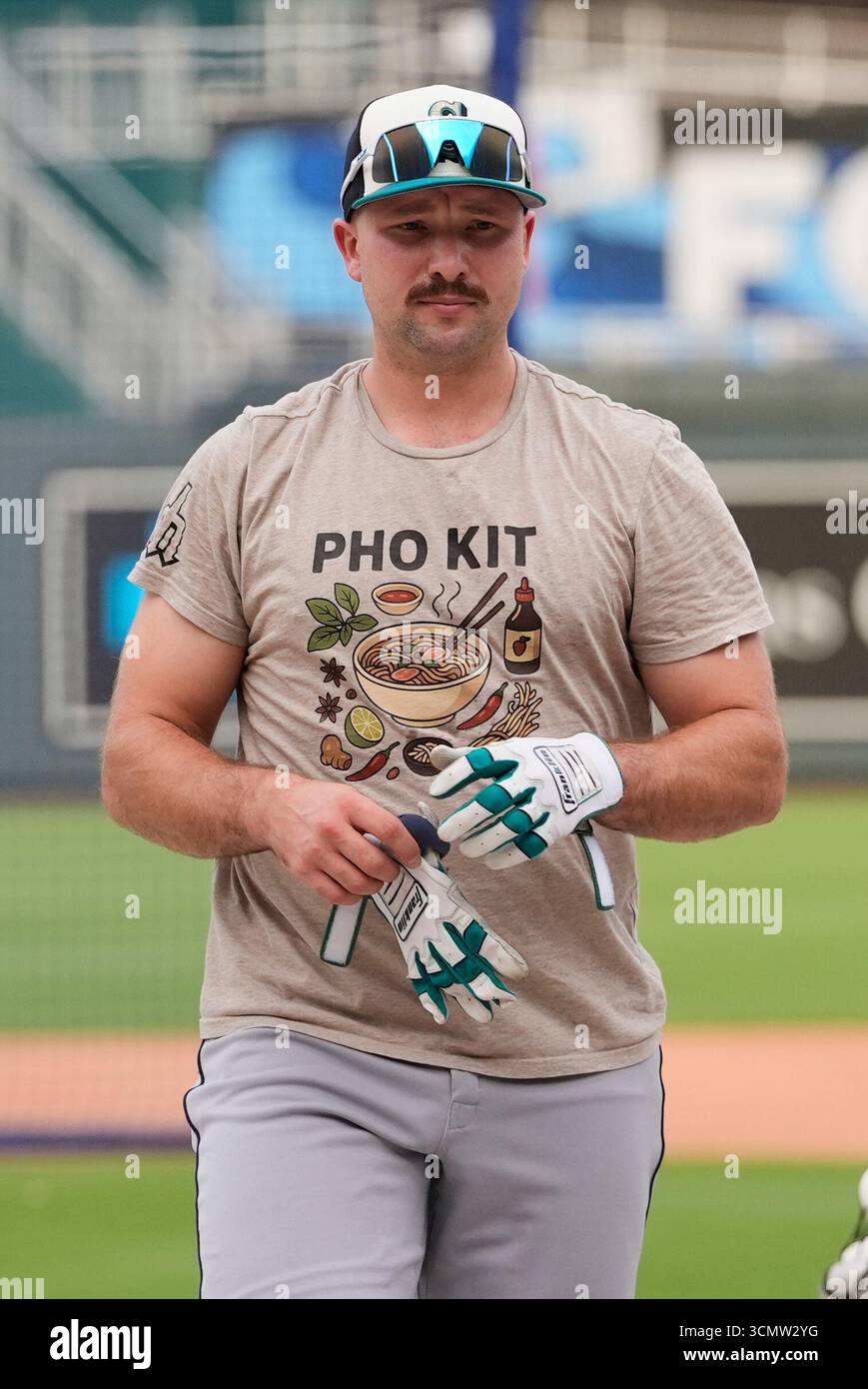 Seattle Mariners' Cal Raleigh walks to the dugout after taking batting ...