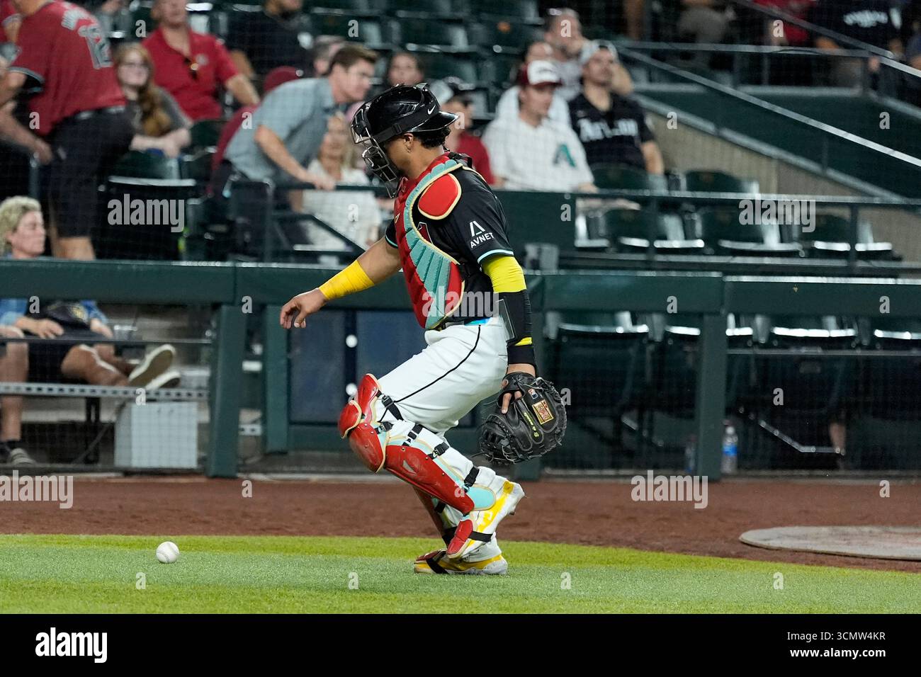 Arizona Diamondbacks catcher Gabriel Moreno chases down a passed ball ...