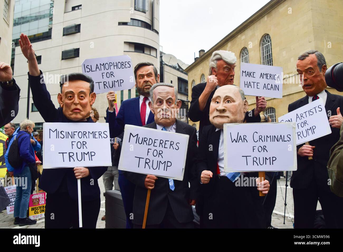 Protesters wearing Donald Trump, Elon Musk, Nigel Farage, Benjamin ...