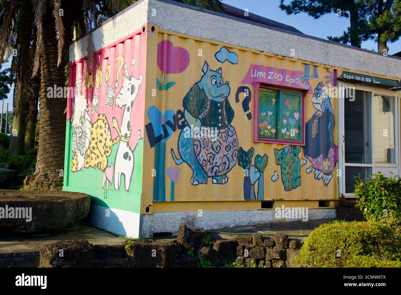 A painted shipping container shows cartoon animals and the words “Lime ...
