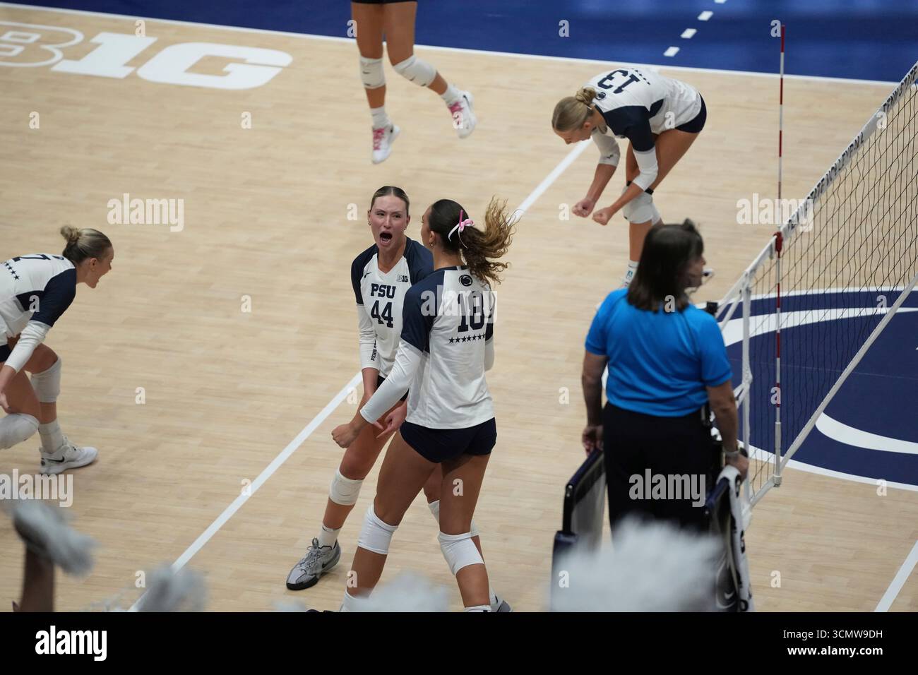 Penn State's middle blocker Maggie Mendelson, left, and right-side ...