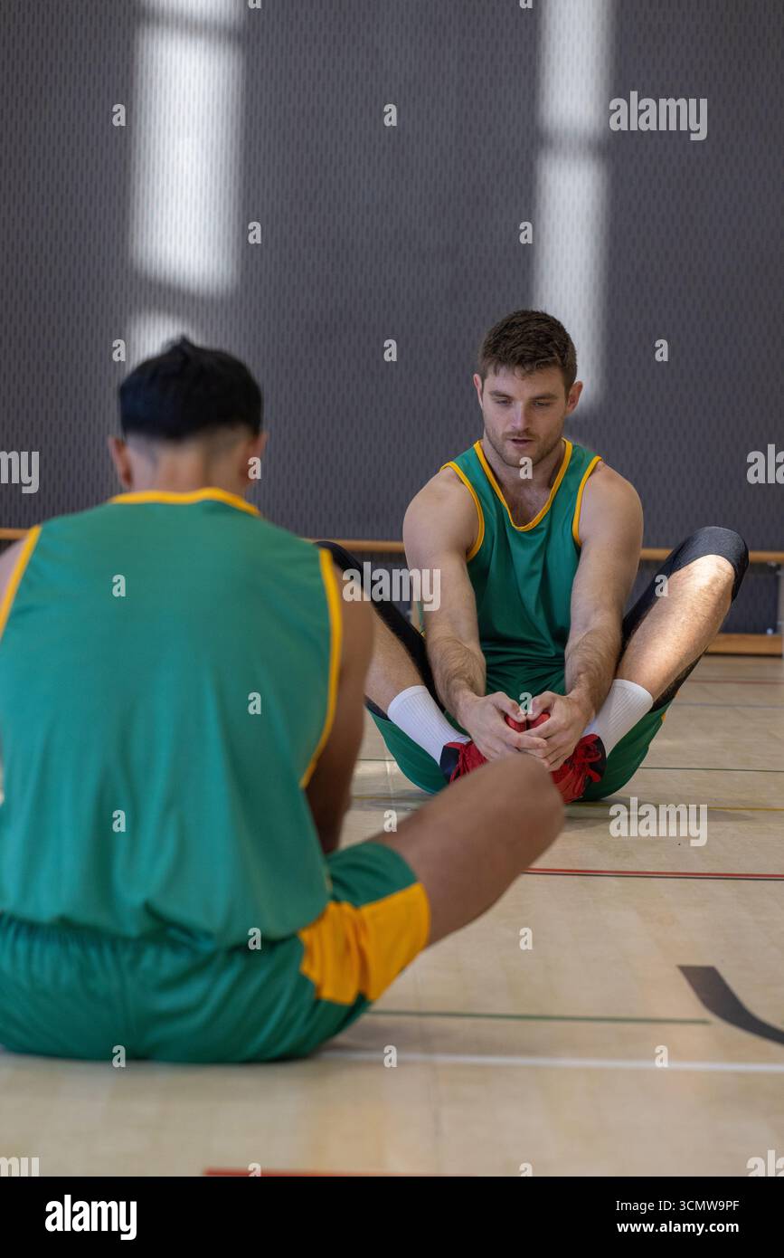 Male teammates in yellow hi-res stock photography and images - Alamy