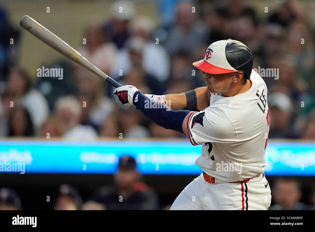 Minnesota Twins third baseman Brooks Lee (2) hits a single in the ...