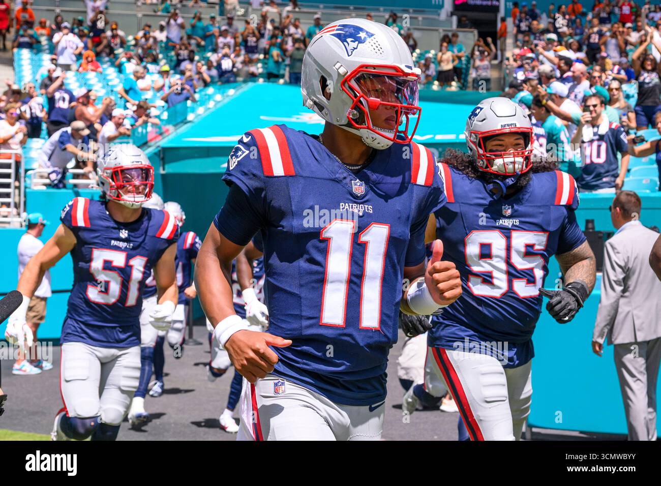 New England Patriots quarterback Joshua Dobbs (11), defensive lineman ...