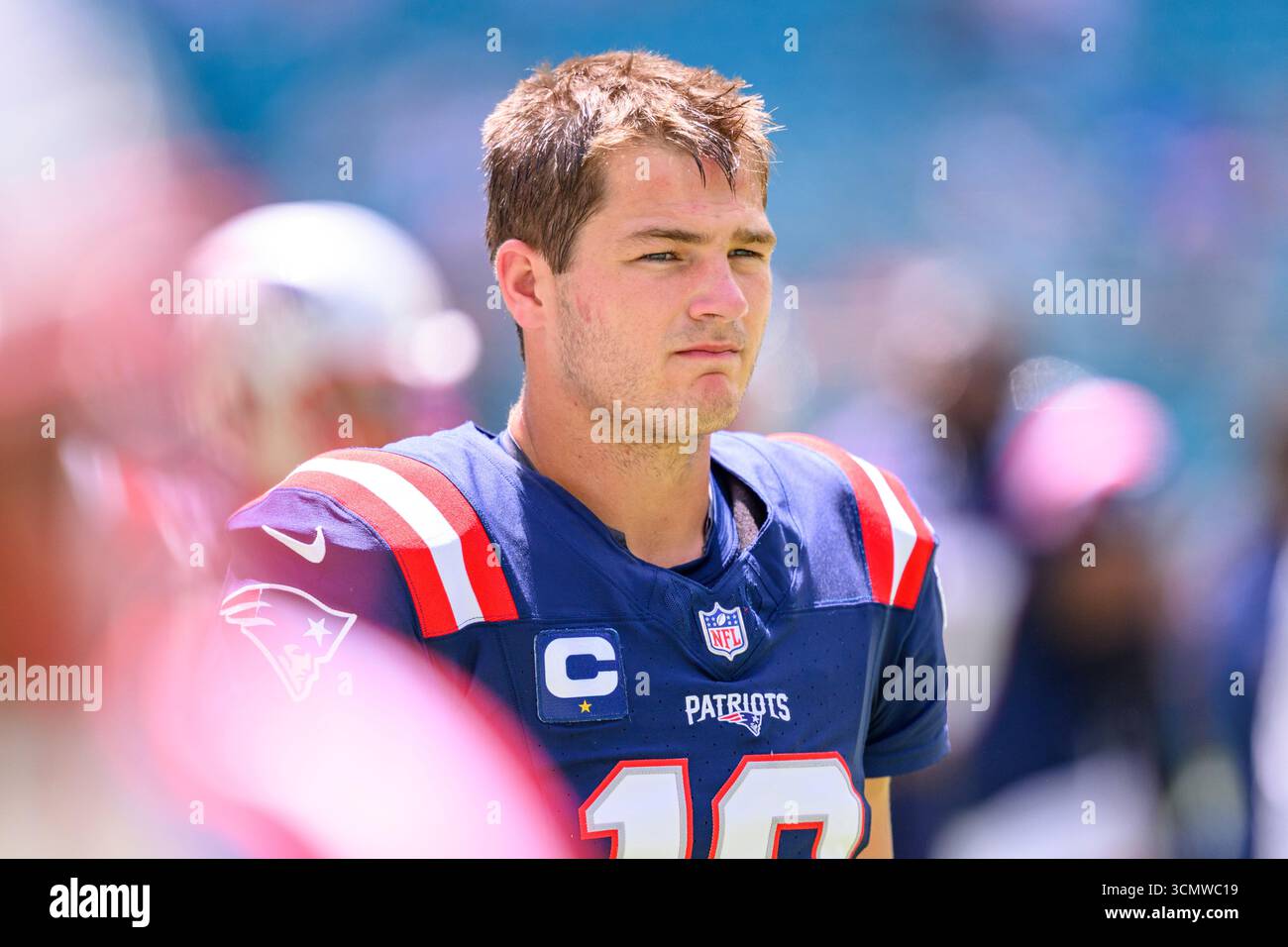 New England Patriots quarterback Drake Maye (10) walks on the field ...