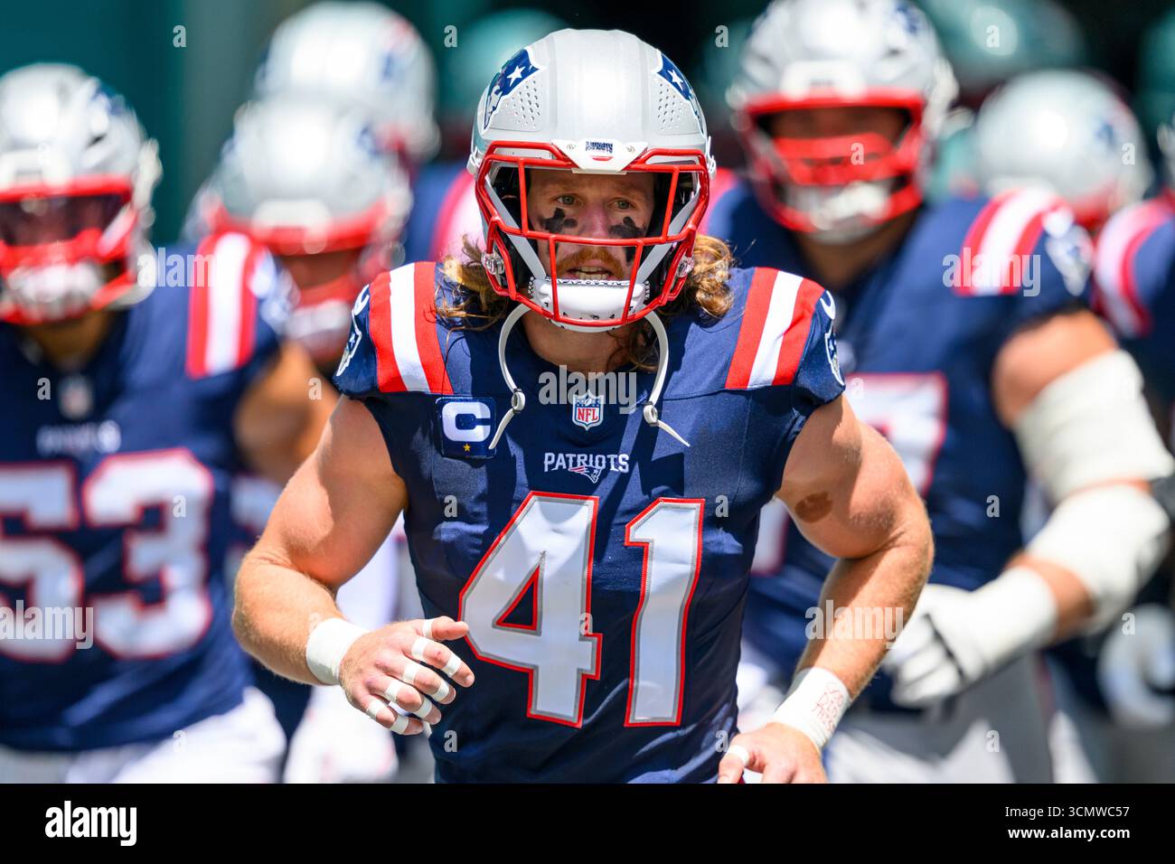 New England Patriots safety Brenden Schooler (41) runs onto the field ...