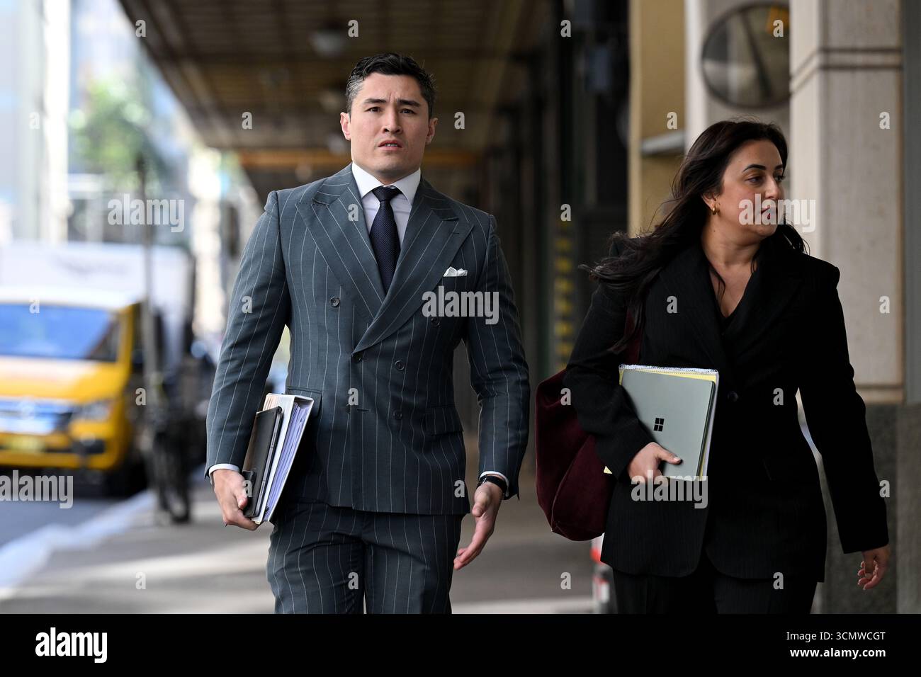 Alan Jones lawyer Bryan Wrench arrives at the Downing Centre Court in Sydney, Thursday ...