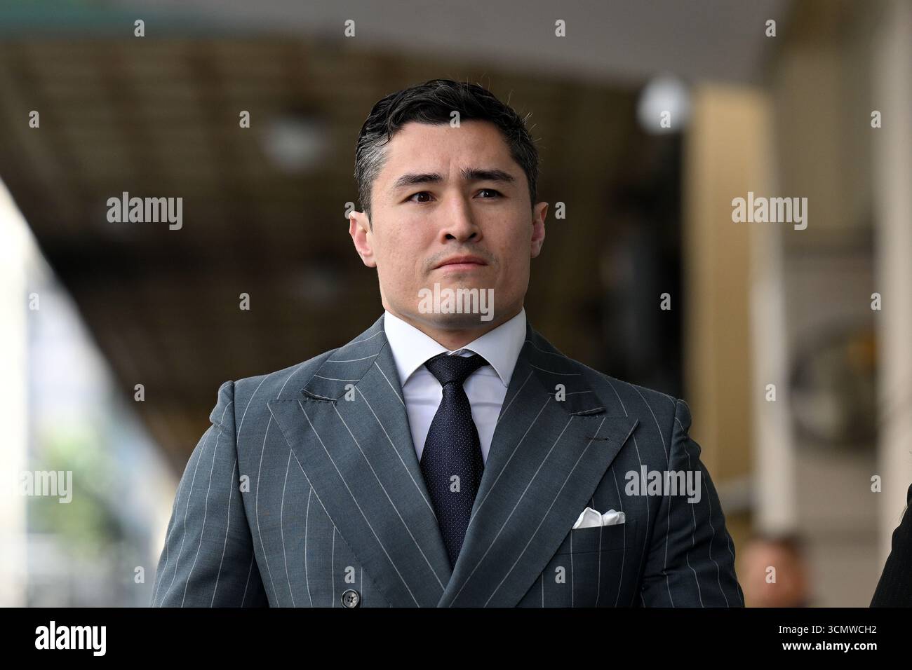 Alan Jones lawyer Bryan Wrench arrives at the Downing Centre Court in ...