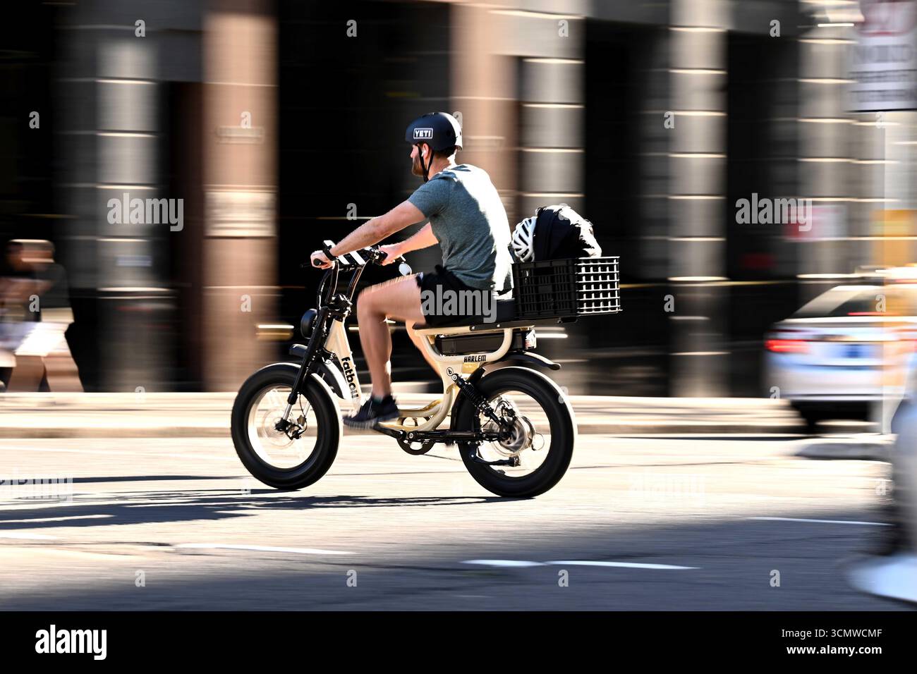 People are seen riding E-Bikes in Sydney, Wednesday, September 17, 2025 ...