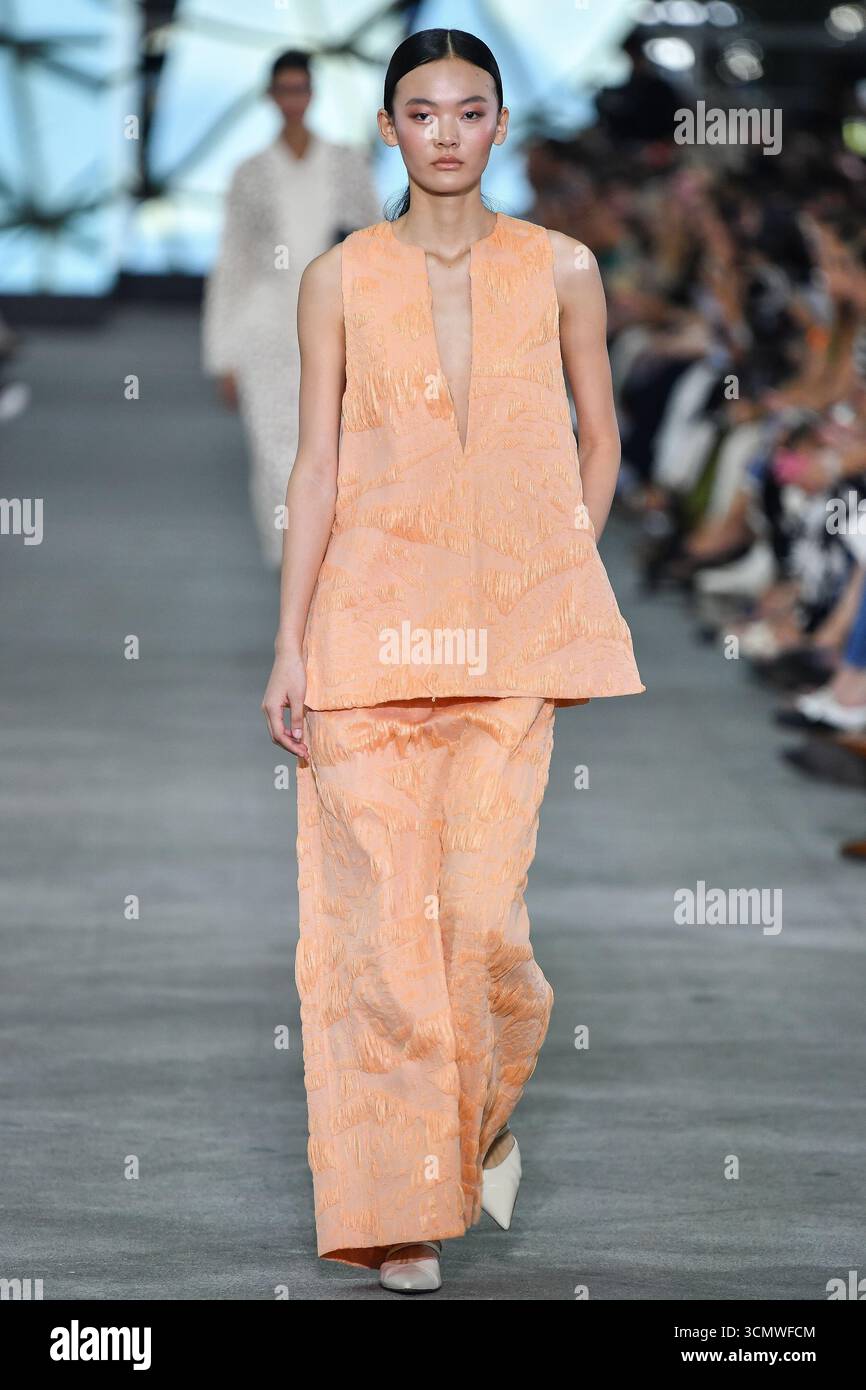 A model walks the runway wearing a design by Simorra during the ...