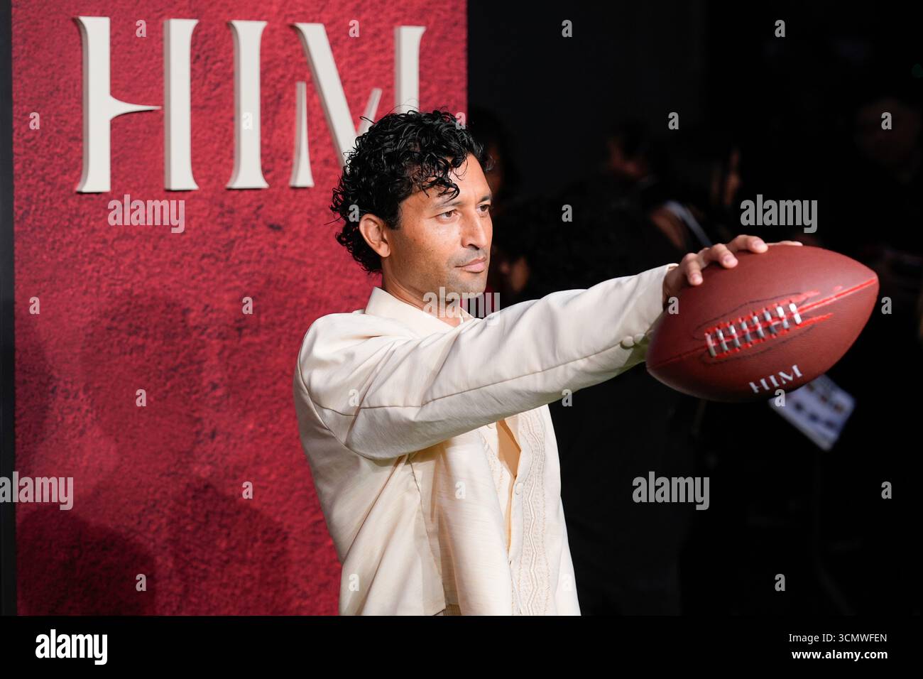 Director Justin Tipping arrives at the premiere of "Him" on Wednesday, Sept. 17, 2025, at TCL ...