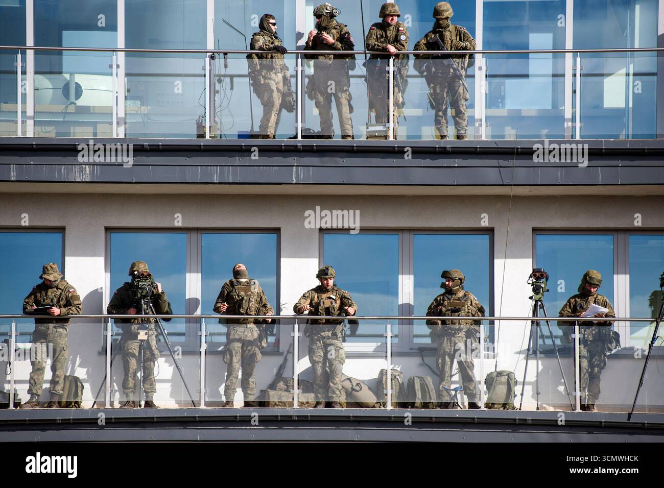 Polish officers seen watching the military exercises of Poland and NATO ...