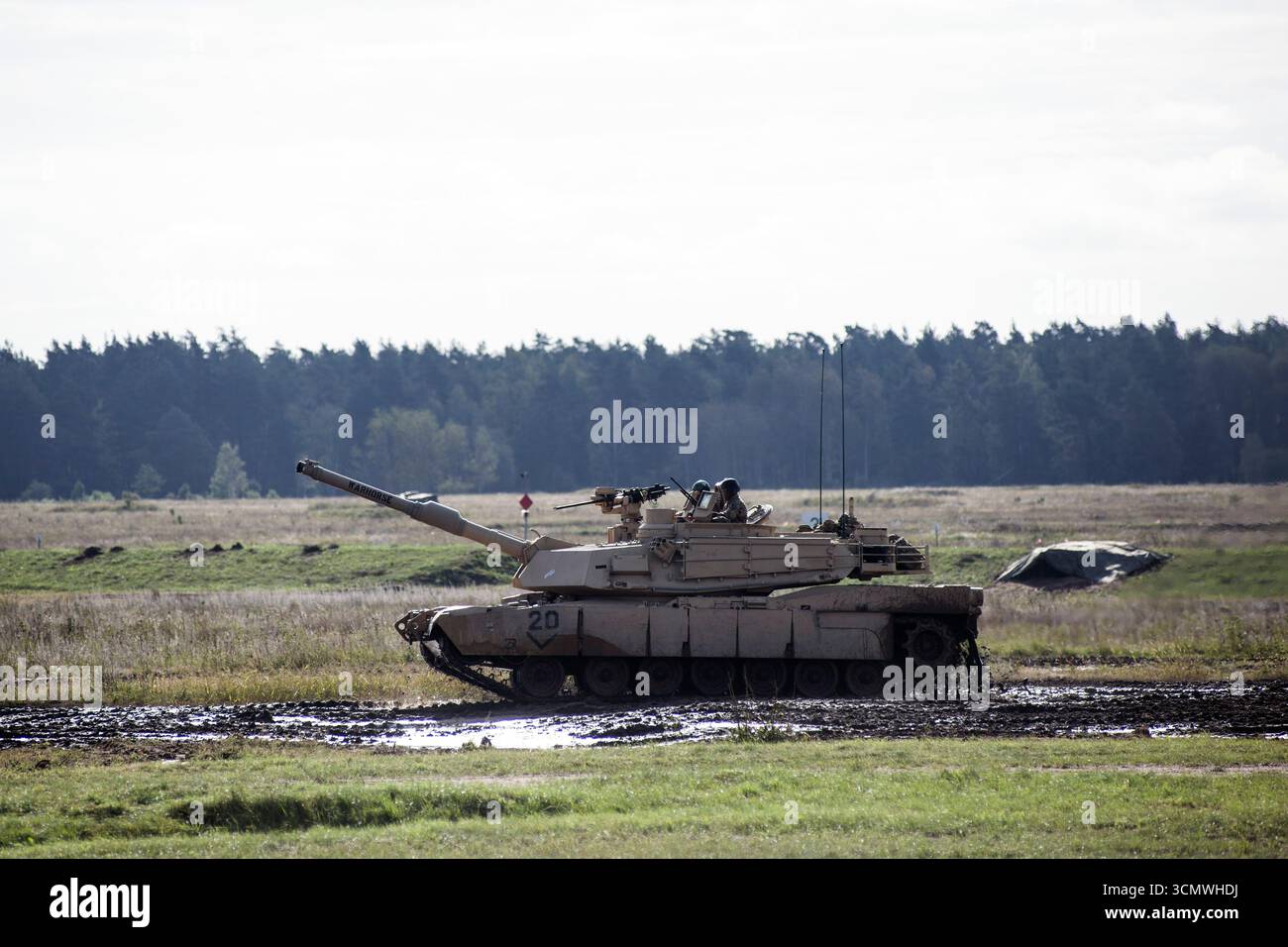 A US-made Abrams tank drives over during military exercises of Poland ...
